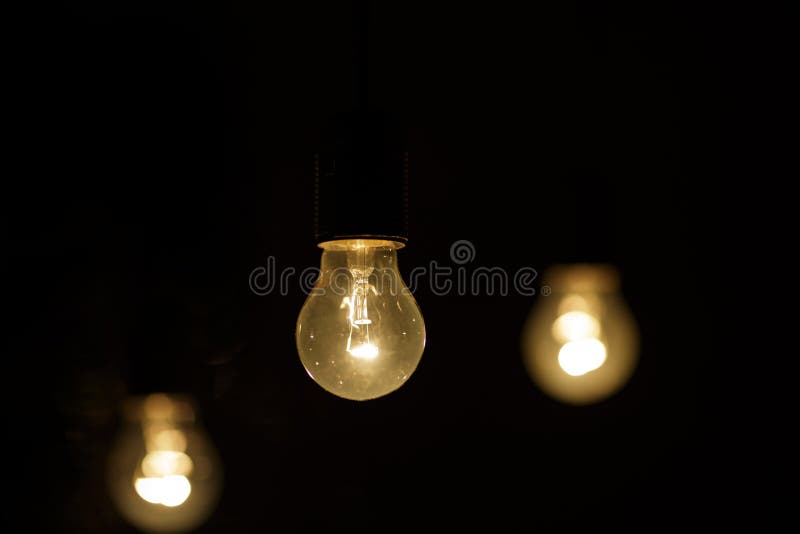 Light Bulbs on a Black Background Stock Photo - Image of bulb ...