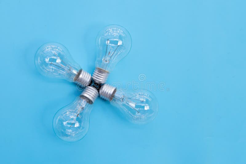 Light Bulbs on Blue Background. Ideas and Creative Thinking Concept ...