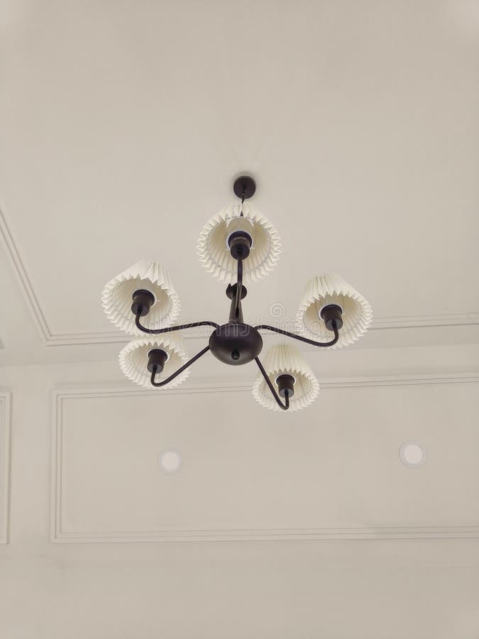 Light Bulbs Hanging from the Ceiling on a White Background Stock Image ...