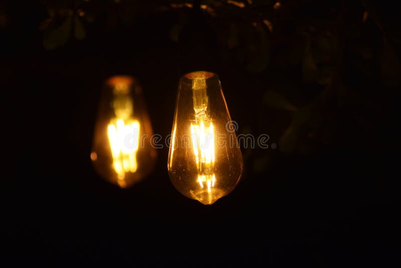 Light bulbs in the night stock image. Image of linear - 243847467