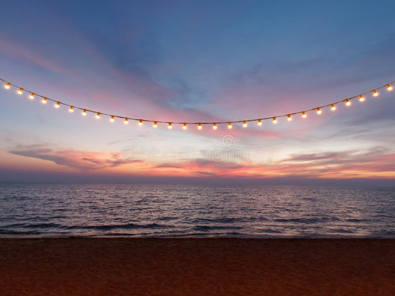 Light Bulbs on String Wire Against Sunset Sky Stock Image - Image of ...