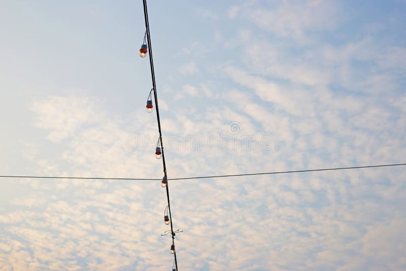 Light Bulbs on String Wire with Sky Stock Image - Image of cloud ...