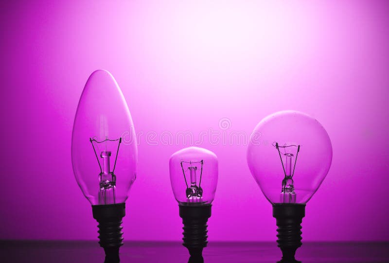 Light Bulbs On Violet Background Stock Photo - Image of filament ...