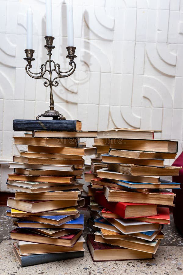 The Light of Candles and the Wisdom of Books Stock Photo - Image of ...