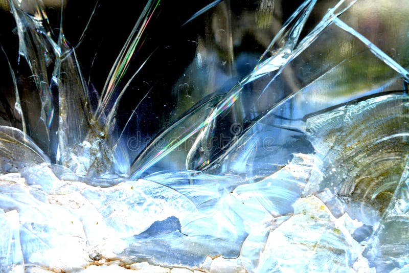 Light Caught in the Reflections of Broken Glass Stock Photo - Image of ...