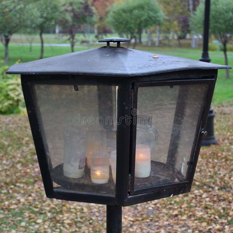 Light at the cemetery stock image. Image of allhelgona - 102651619