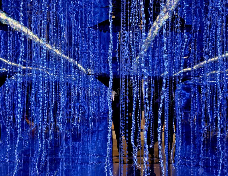 Light Chains on a Dark Blue Background Resemble a Starry Sky at Night ...