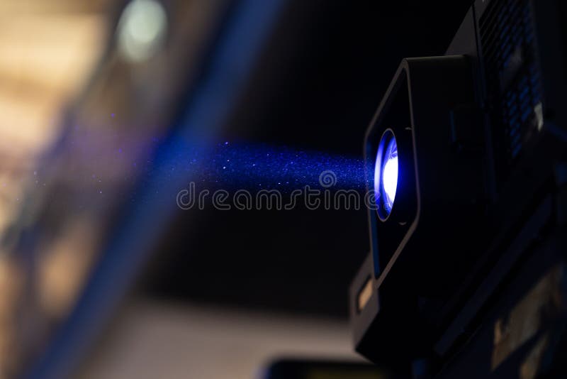 Light from the Cinema Spotlight Broadcasting the Presentation Stock ...