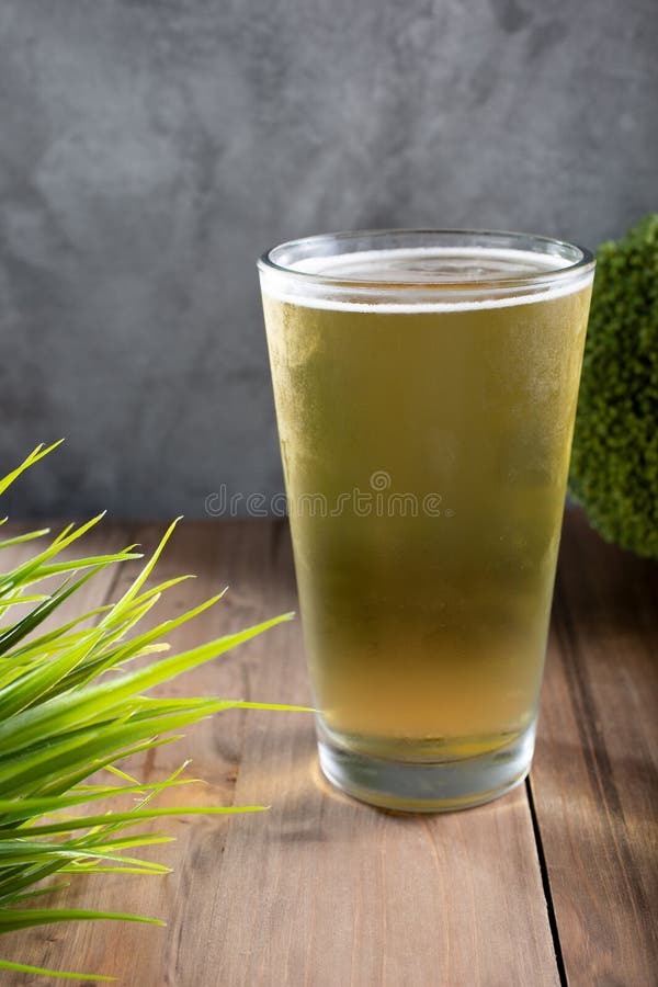 Light Colored Beer in Glass Stock Image - Image of hops, lifestyle ...