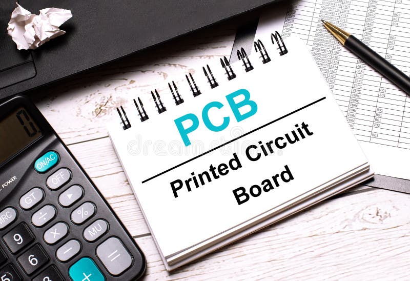 On a Light-colored Office Table is a Computer, a Black Calculator, a ...