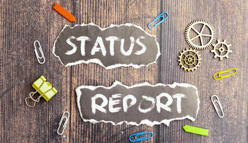On a Light Colored Office Table with the Text Status Report. Business ...
