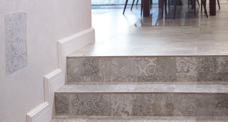 Light Colored Patterned Tile Steps in House. Decorative Putty ...