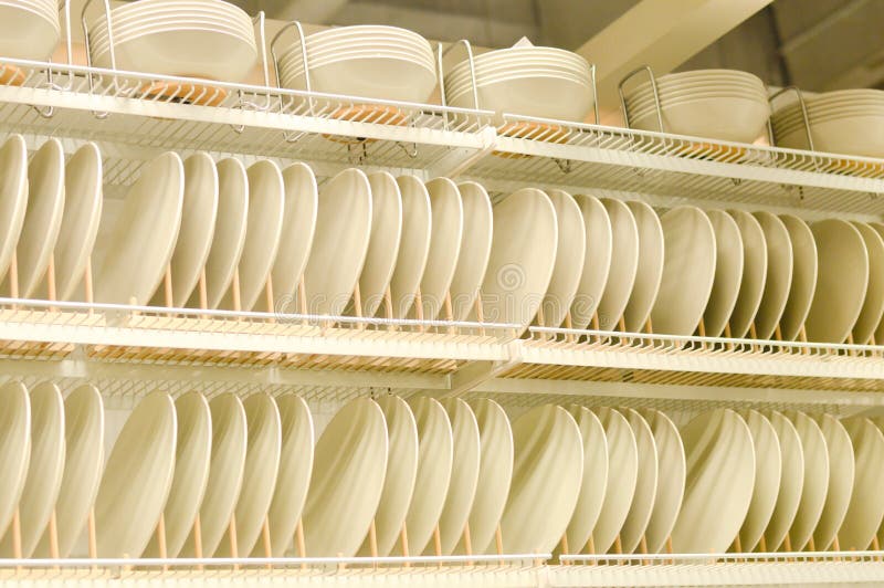 Light Colored Plates on Shelf Stock Photo - Image of dining, closet ...
