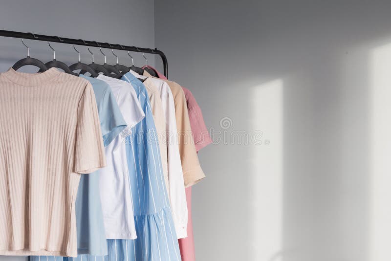 Colored Womens Summer Clothes on Hanger Stock Photo - Image of beige ...