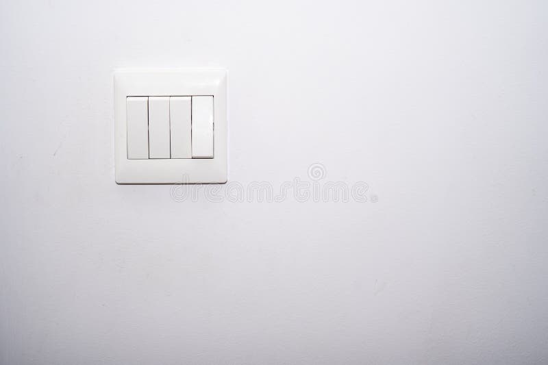 Light Control Switch White Color Installed on the White Color Wall ...