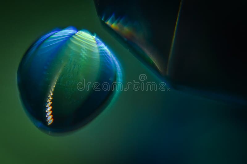 Light Diffraction Showing Rainbows on Water Drops Stock Image - Image ...