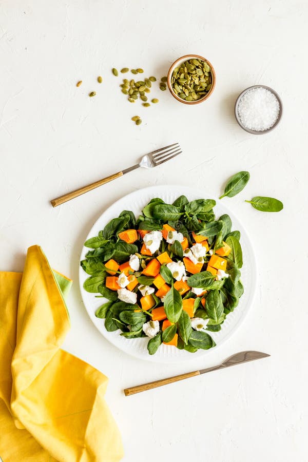 Light Dish for Lunch. Salad with Pumpkin and Basil on White Background ...