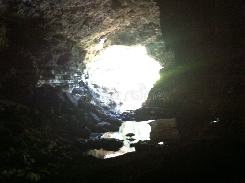 The Light at the End of the Cave Stock Photo - Image of light, cave ...