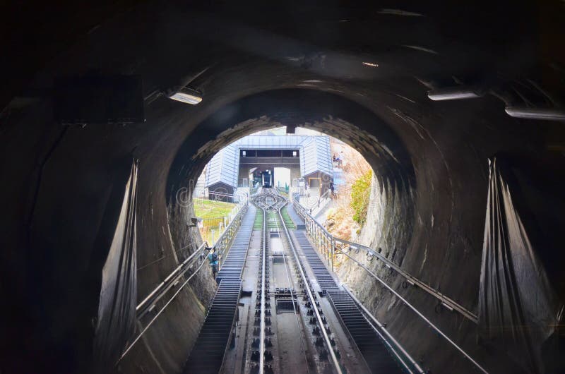 Light at the End of the Tunnel Concept - Train Exit from an Underground ...