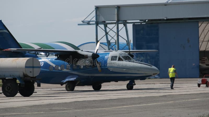 Light-Engine Propeller Aircraft with a Rotating Propeller Stands at the ...