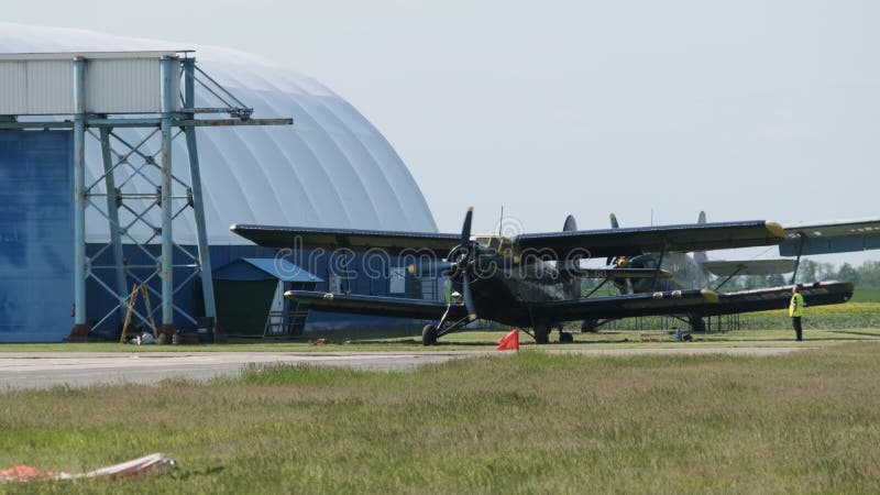 Light-Engine Propeller Aircraft with a Rotating Propeller Stands at the ...