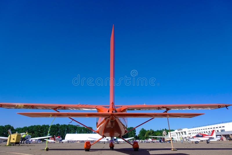 Light-engine Training Aircraft of Red Color on the Runway. Back View ...