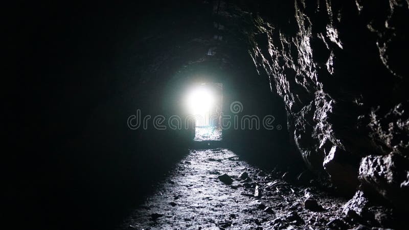Light and Exit at the End of the Wet Cave Stock Photo - Image of door ...