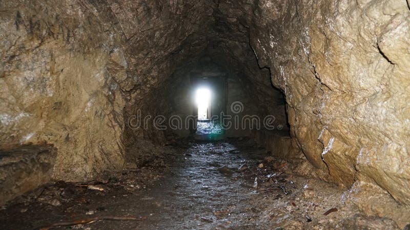 Light and Exit at the End of the Wet Cave Stock Image - Image of wall ...