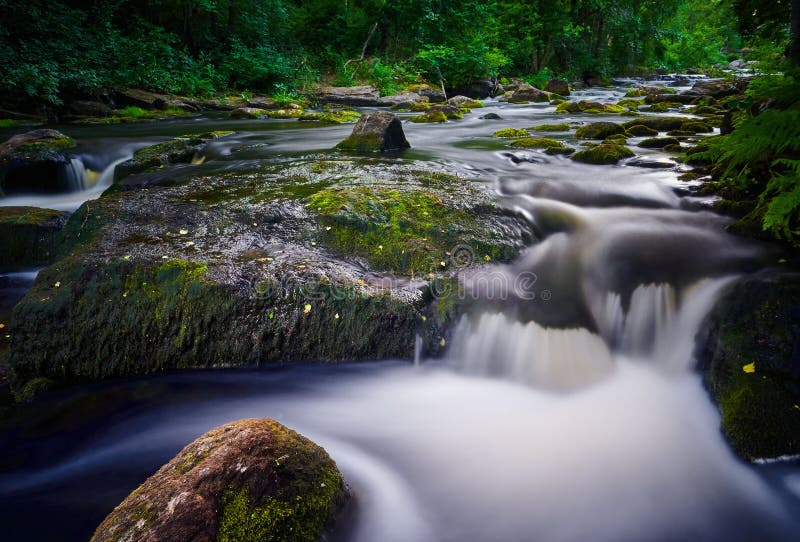 Light Exposure Stream of Water Over Rocks Stock Image - Image of spring ...