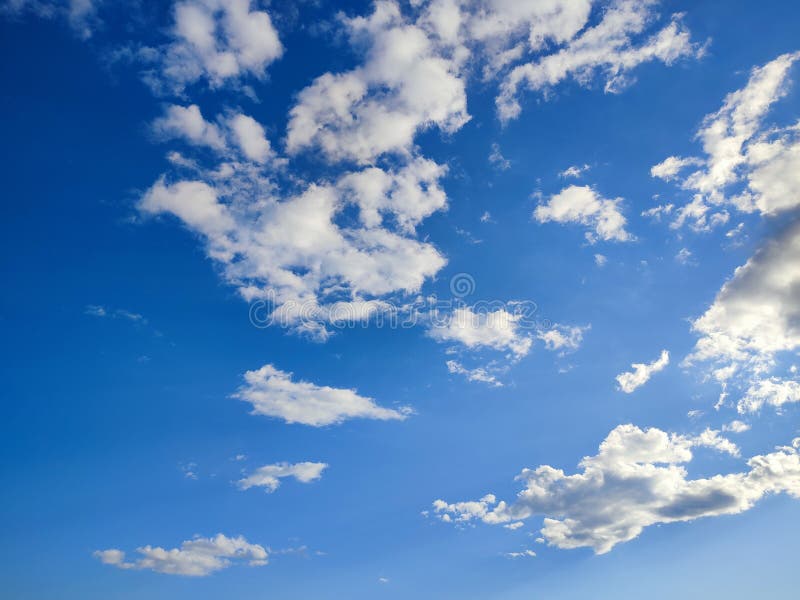 Light Fancy Clouds in an almost Clear Sky Stock Image - Image of dawn ...