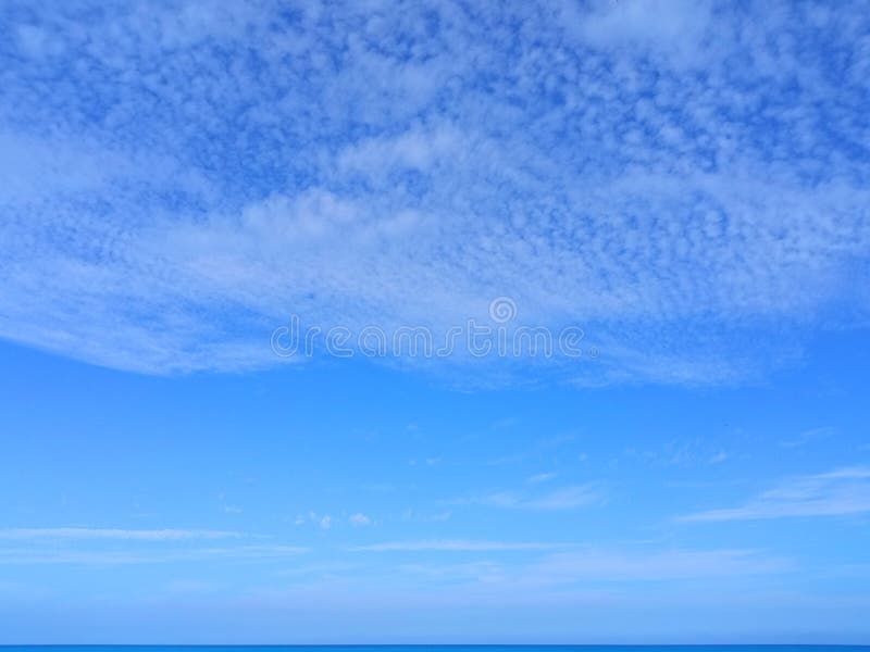 Light Feather Clouds in the Blue Sky Above the Sea Horizon Stock Photo - Image of cloud, climate ...