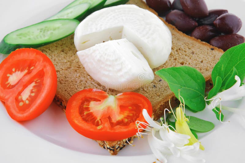 Light feta and tomatoes stock photo. Image of basil, isolated - 36711534