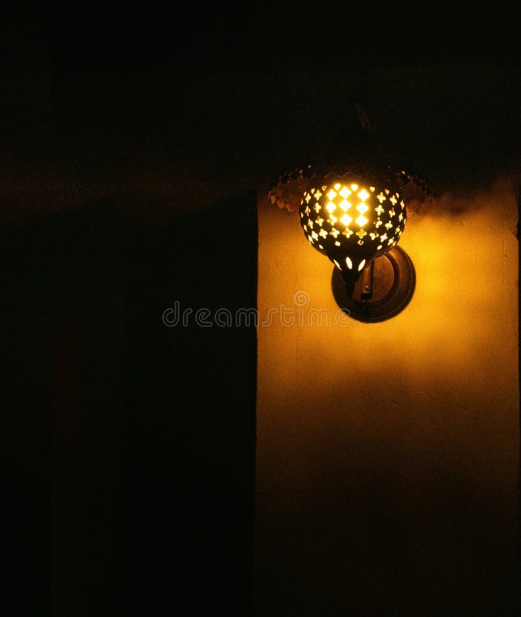 Light Fixture Casting Illumination on a Textured Wall. Stock Image ...