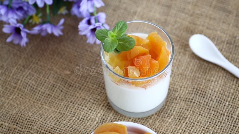 Light Fruit Yogurt with Dried Apricots on Dark Wooden Table Stock ...