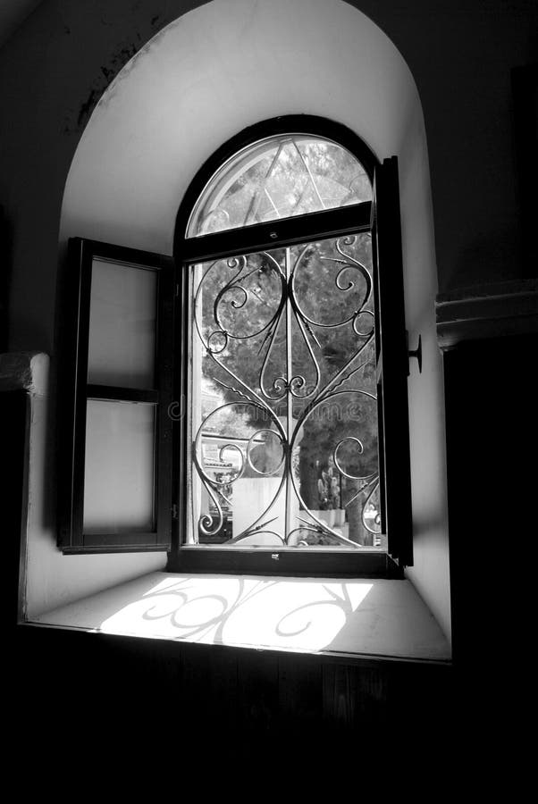 Arch Window in Shadows stock photo. Image of battlements - 162094398