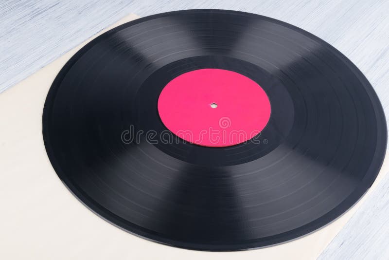 On a Light Gray Background, on a Paper Envelope, is a Vinyl Record ...