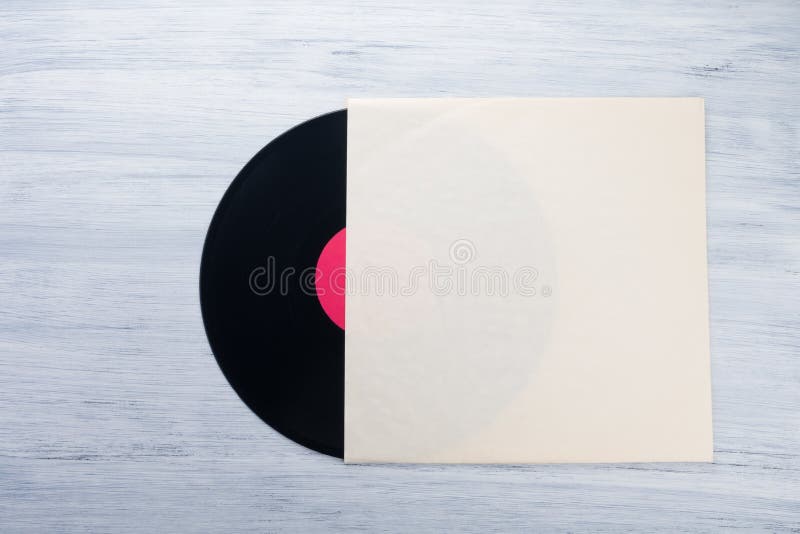 On a Light Gray Background is a Vinyl Record in a Paper Envelope Stock ...