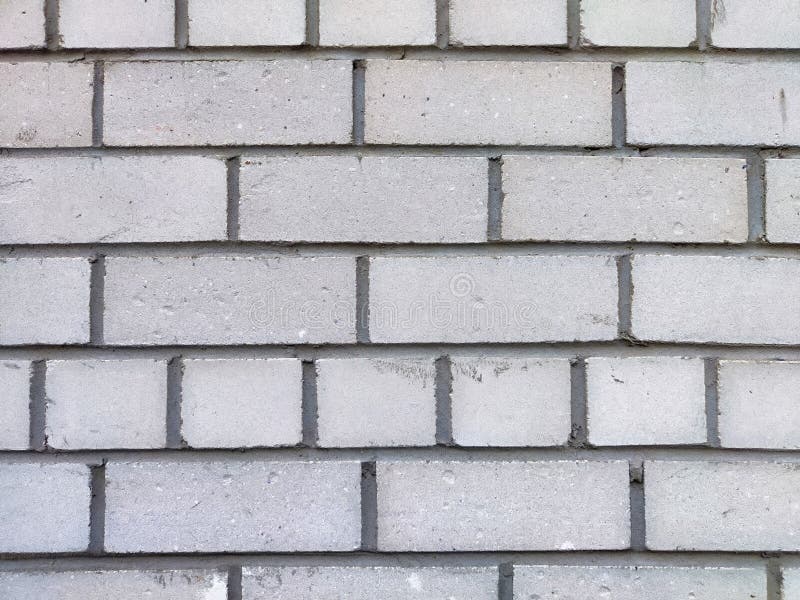 Light Gray Concrete Bricks Arranged in a Uniform Pattern on a Wall ...