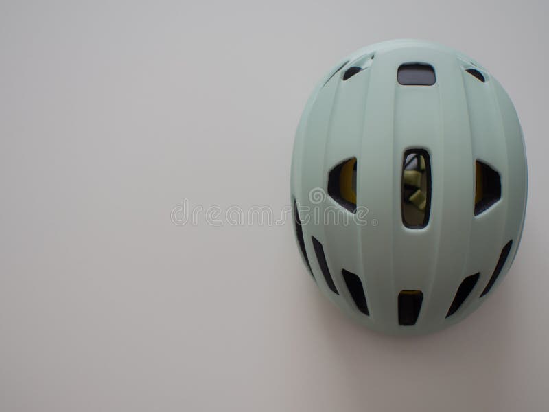 Helmet hanging on the wall stock photo. Image of sports - 370304792