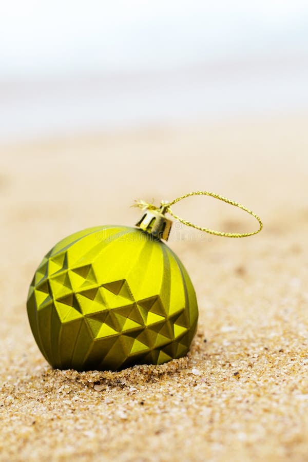 Light Green Christmas Ball on the Sandy Shore Stock Photo - Image of ...