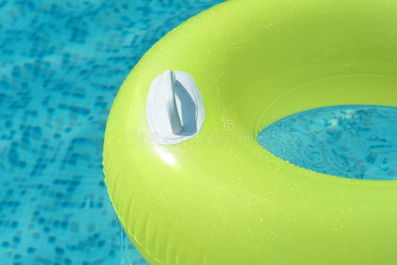 Light Green Inflatable Ring Floating in Swimming Pool, Closeup Stock ...