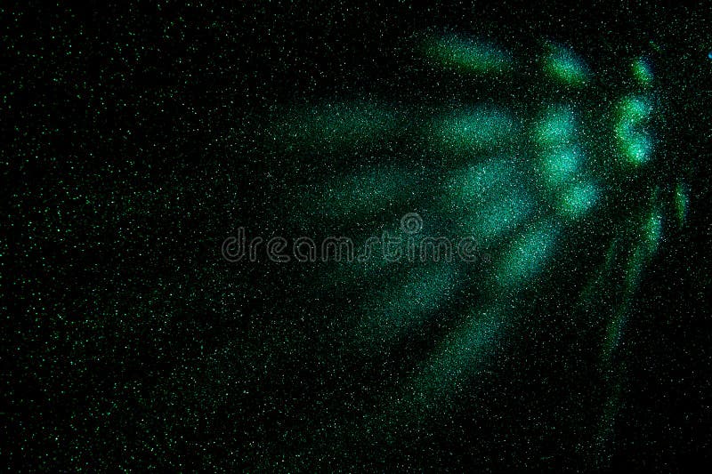 Light Green Rays of Light on a Dark Green Finely Grained Background ...
