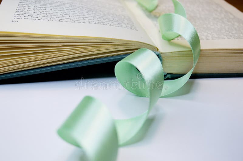 Light Green Ribbon Bookmark in a Book Stock Photo - Image of dream ...