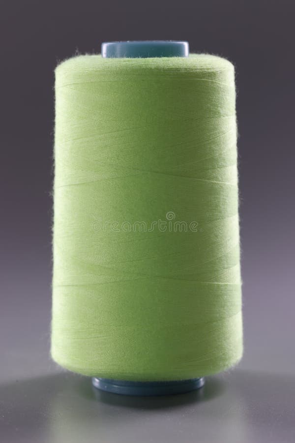Green Spool of Thread Isolated on White Background. Skein of Woolen ...