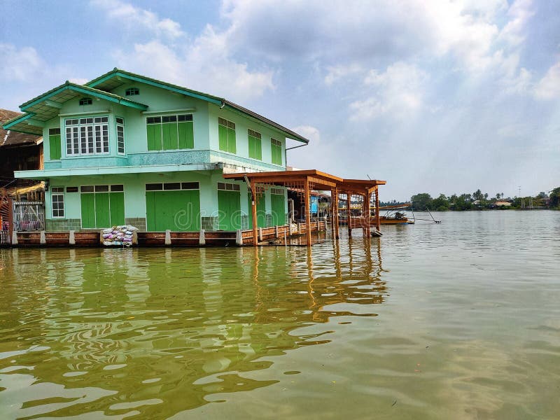 Light Green Two-story House by the River Stock Image - Image of light ...