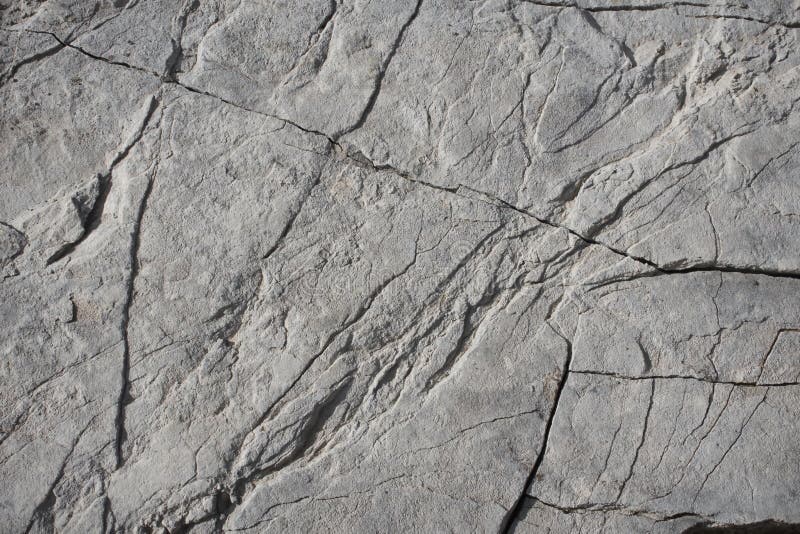 Light Grey Rock Texture Background with Cracked Surface Stock Photo ...