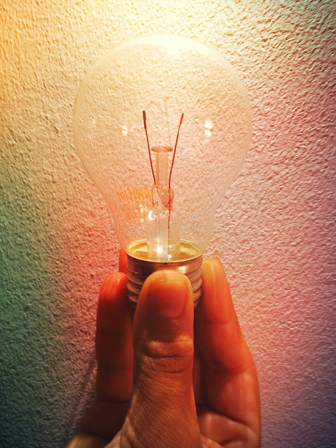 Light stock photo. Image of light, holding, hand, eletric - 72837458