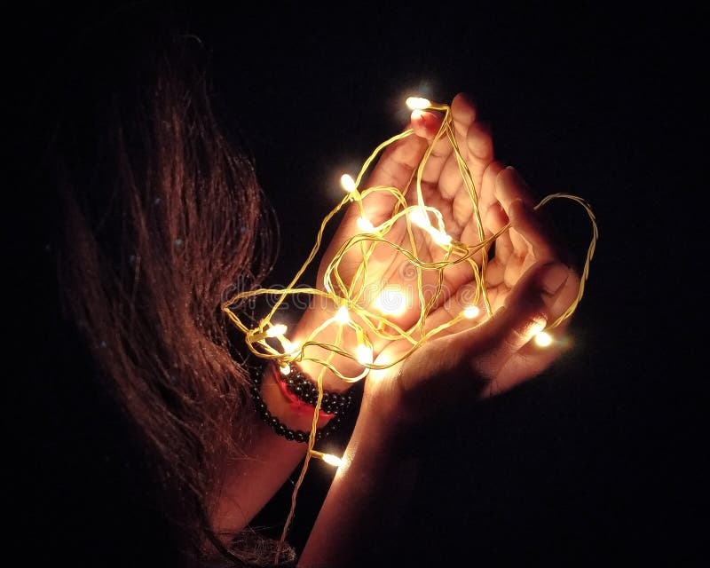 Light in Hand Toches the Soul. Stock Image - Image of light, girl ...