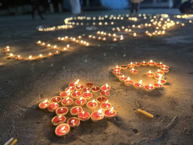 Light Heart-shaped and Star-shaped Candles on a Cold Night Stock Photo ...