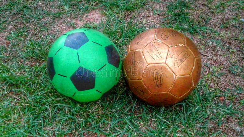 Light and heavy balls stock image. Image of plastic, football - 77407767